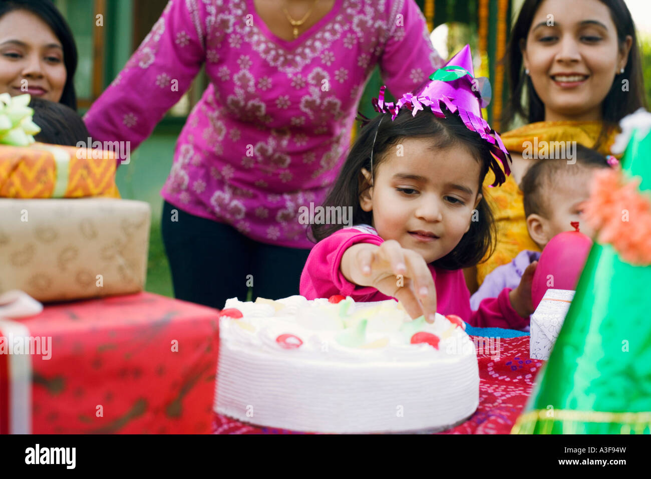 Group of people celebrating a birthday party Stock Photo - Alamy