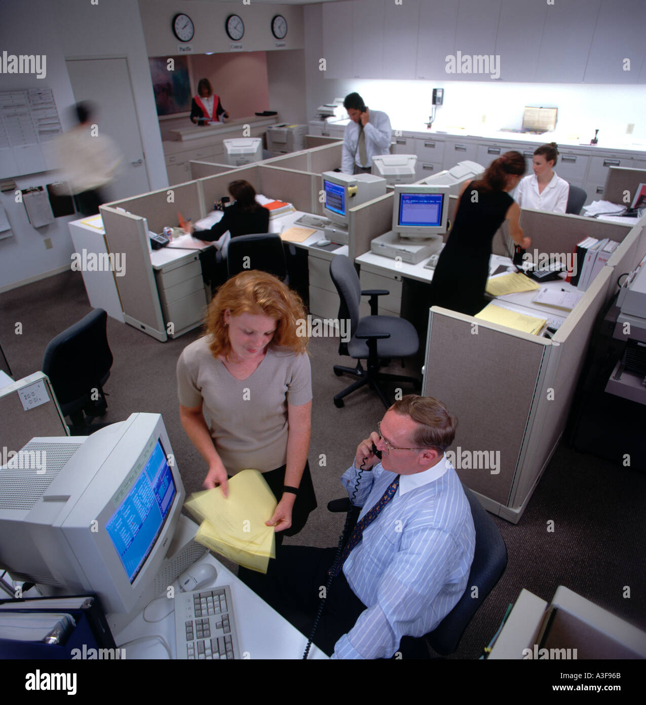 Group of employees working in shared work environment Stock Photo - Alamy