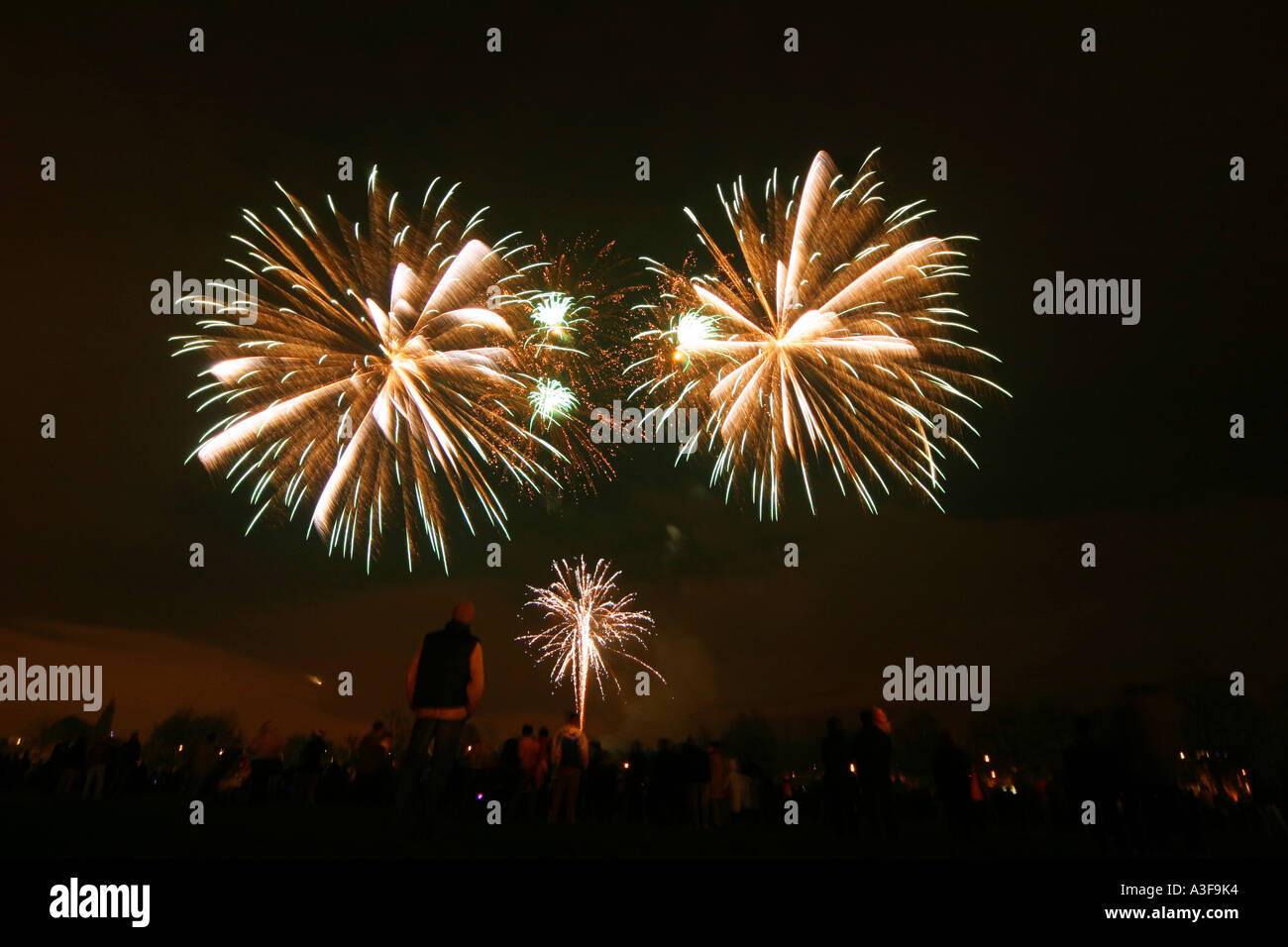 People watching fireworks Stock Photo - Alamy