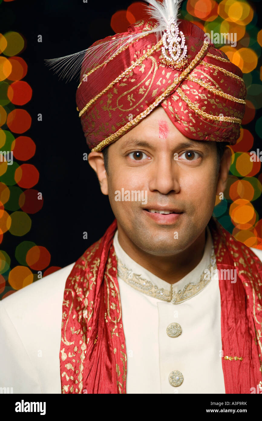 Portrait of a groom in a traditional wedding outfit Stock Photo - Alamy