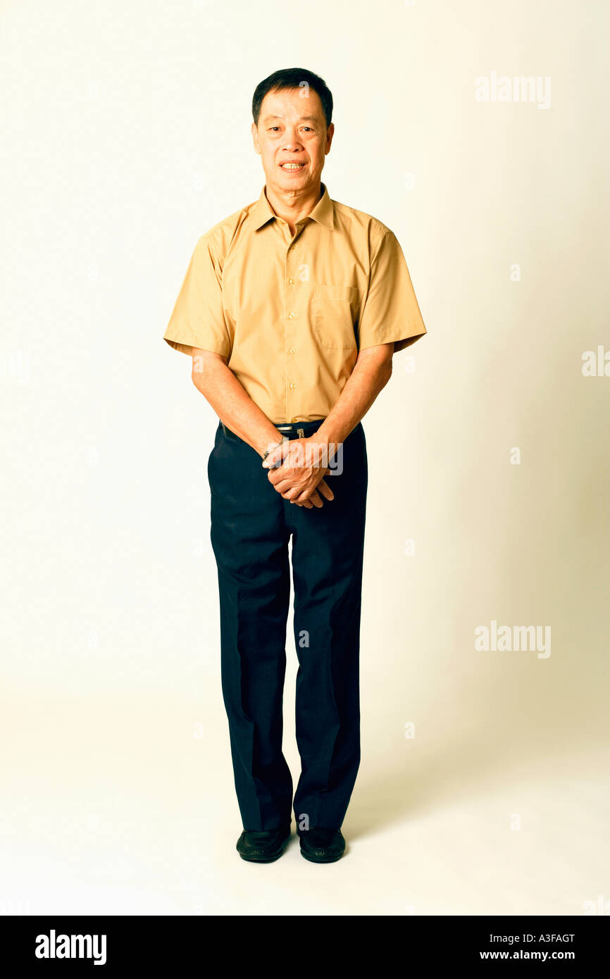 Portrait of a senior man standing Stock Photo - Alamy