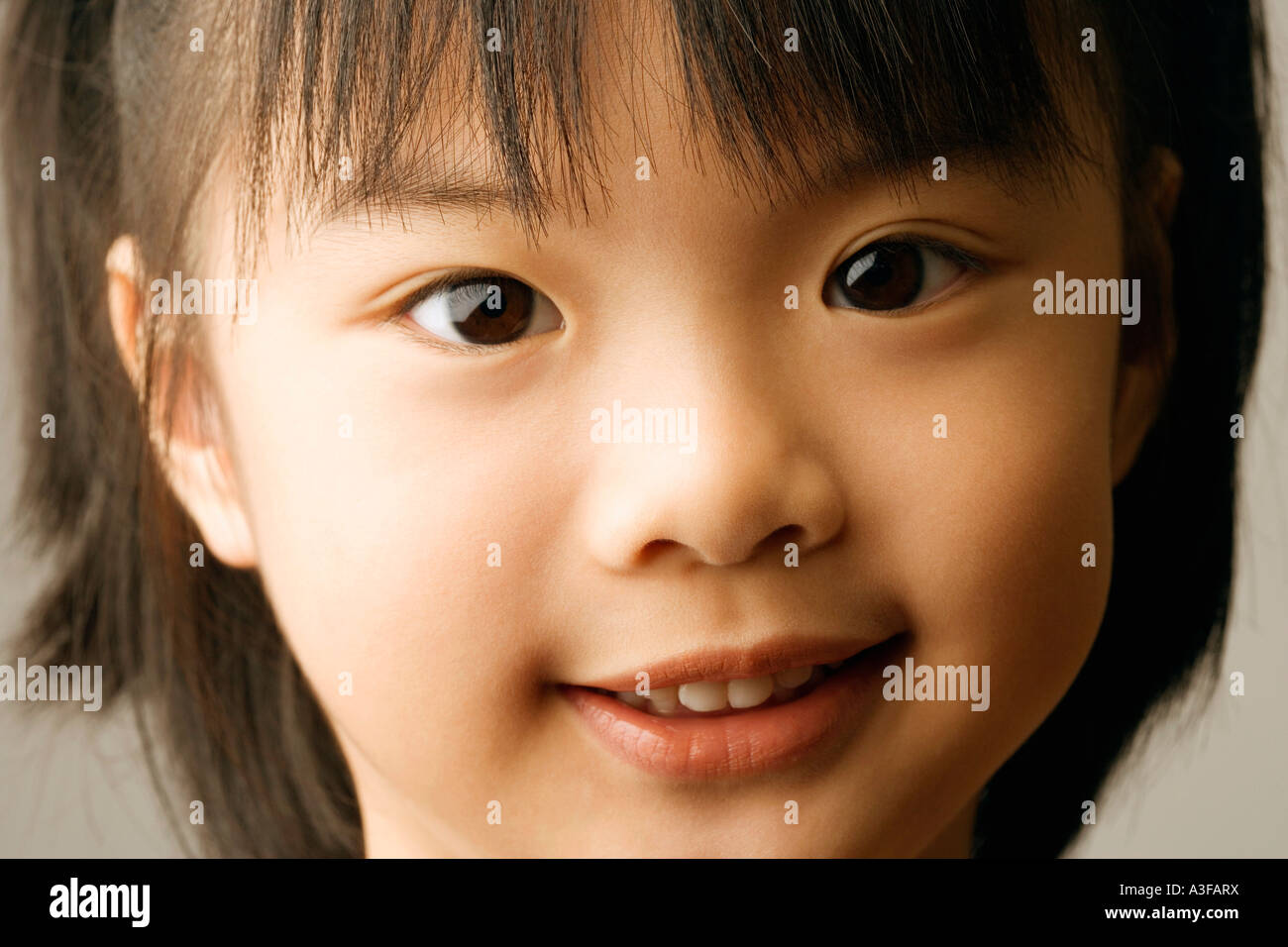 Portrait of a girl smiling Stock Photo - Alamy