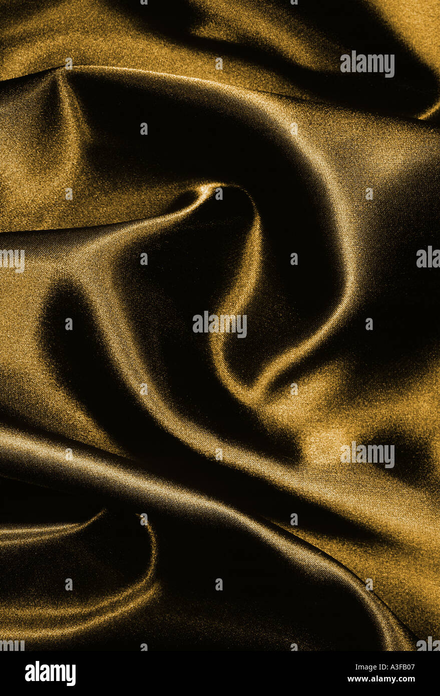 Gold silk fabric hi-res stock photography and images - Alamy