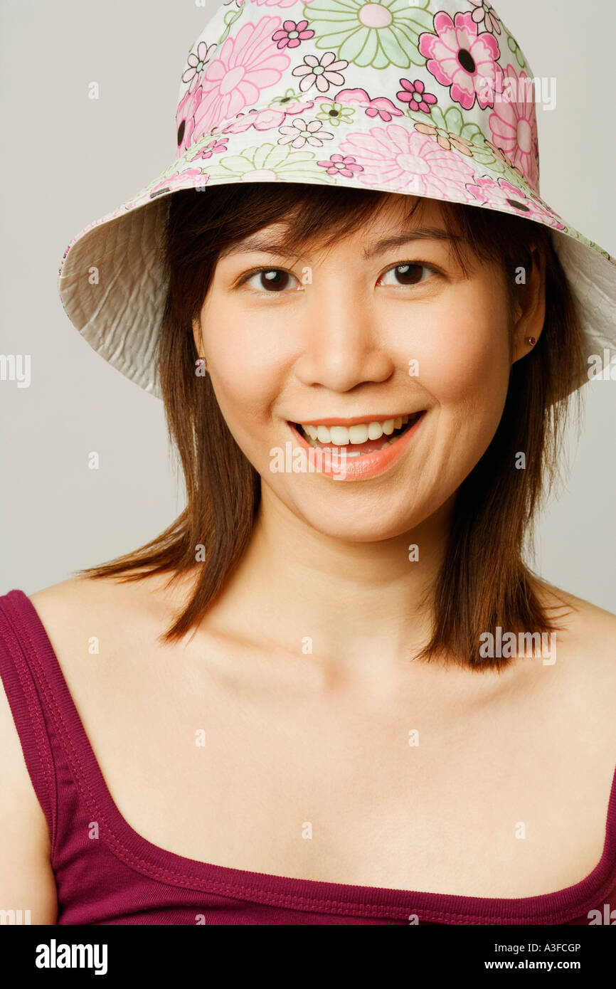 Smiling asian wearing bucket hi-res stock photography and images - Alamy