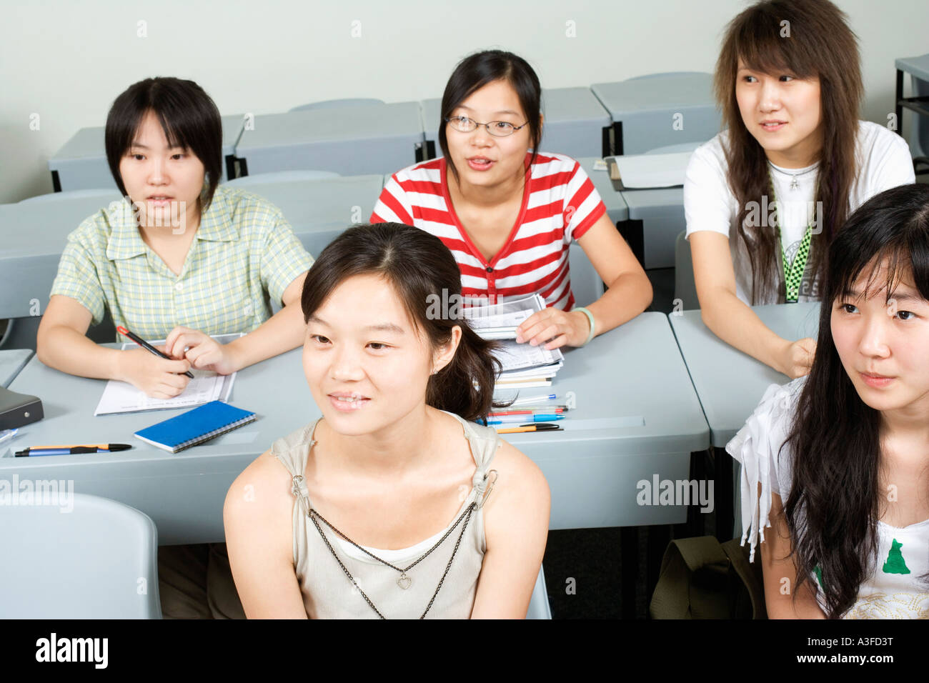 Student sitting in a classroom Stock Photo - Alamy