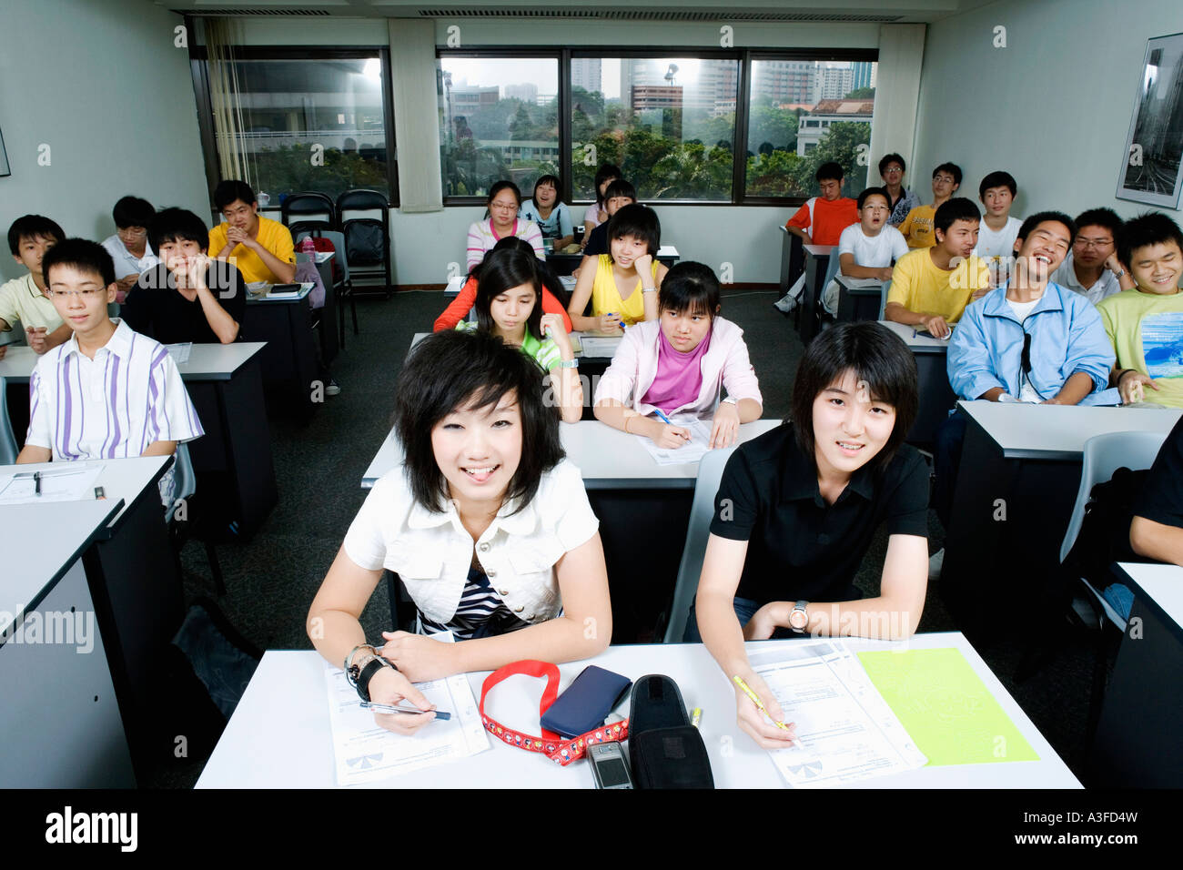 High angle view of students sitting in a classroom Stock Photo - Alamy