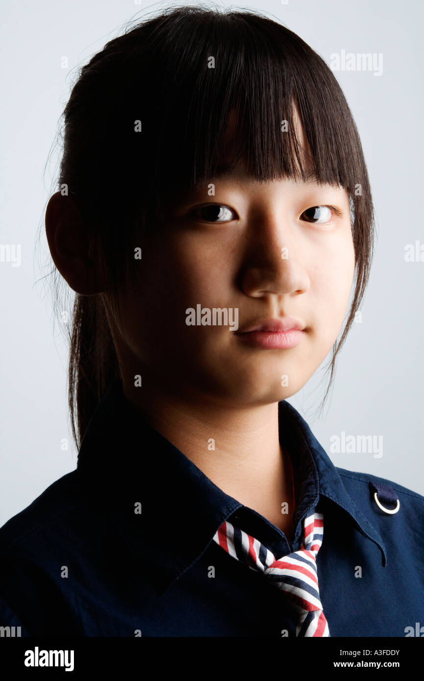 Portrait of a teenage girl thinking Stock Photo - Alamy