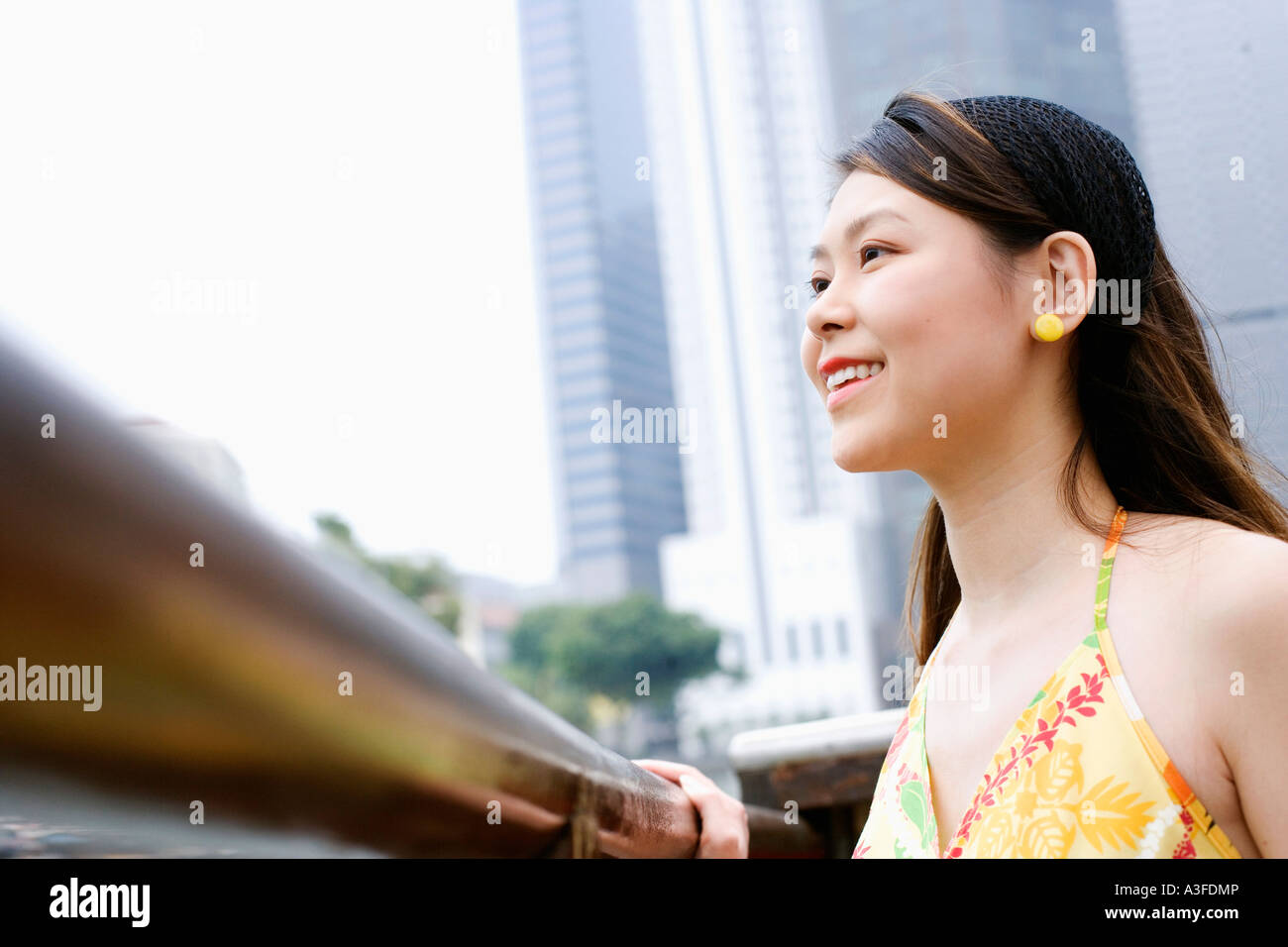 Side profile of a young woman smiling Stock Photo - Alamy