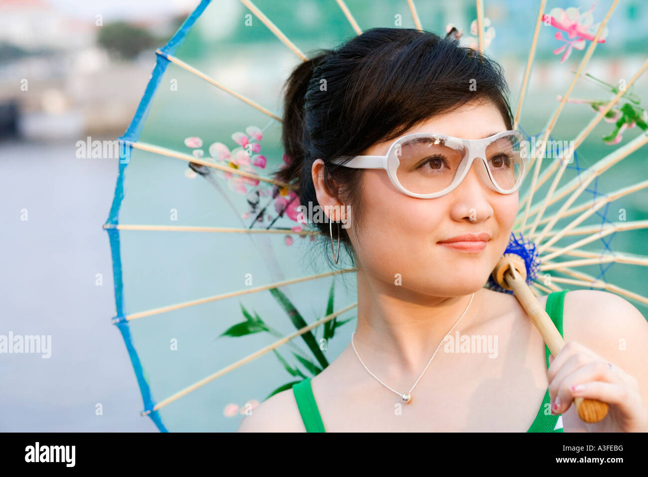 Woman with a parasol hi-res stock photography and images - Alamy