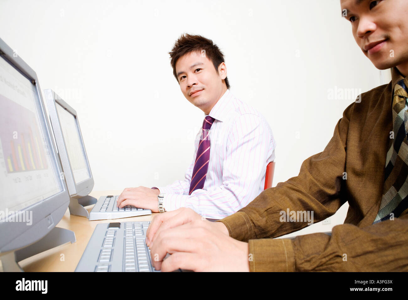 Work mates computers hi-res stock photography and images - Alamy