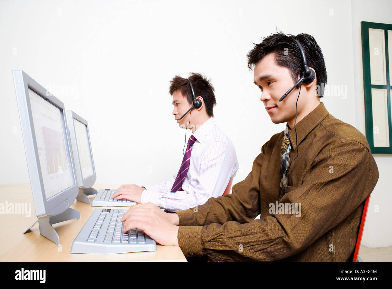 Two executives with headset hi-res stock photography and images - Alamy