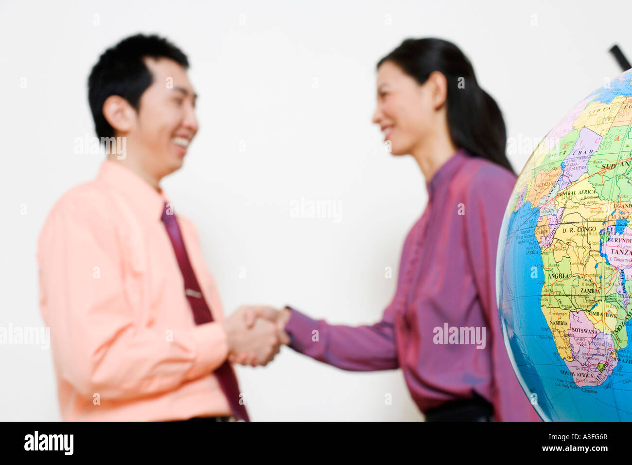 Two gentlemen shaking hands hi-res stock photography and images - Alamy