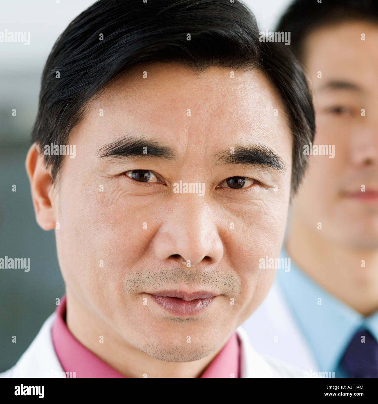 Close up mature doctors face hi-res stock photography and images - Alamy