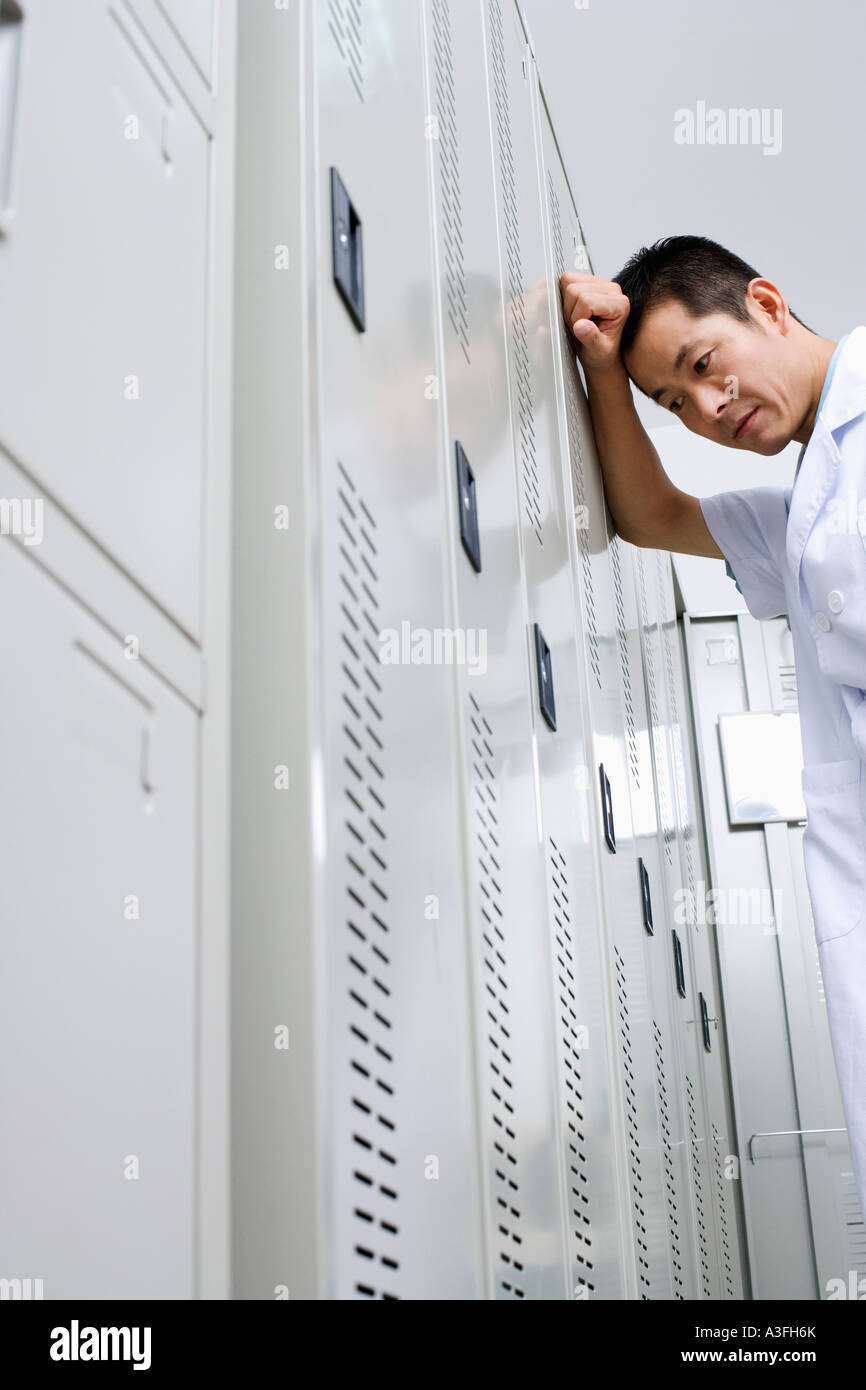 Black man lab coat thinking hi-res stock photography and images - Alamy