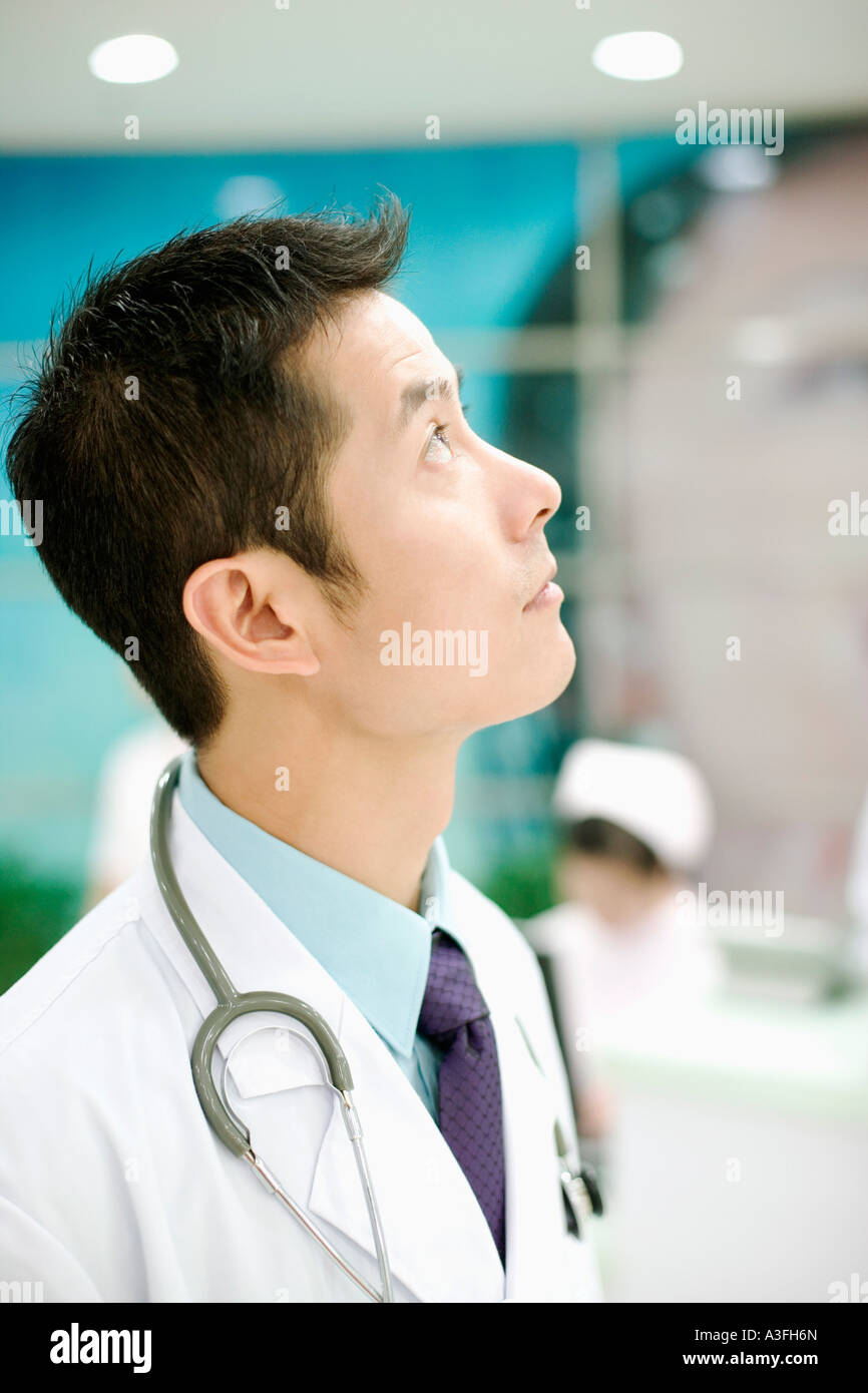 Side profile of a doctor with a stethoscope around his neck Stock Photo ...