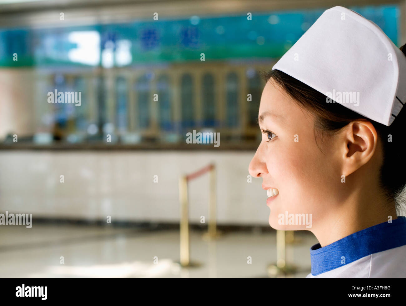Side profile of a female nurse smiling Stock Photo - Alamy