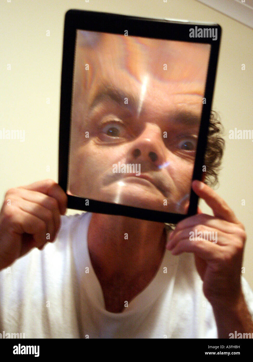 MALE WITH DISTORTED FACE BEHIND MAGNIFYING GLASS VERTICAL BAPDA8899 ...