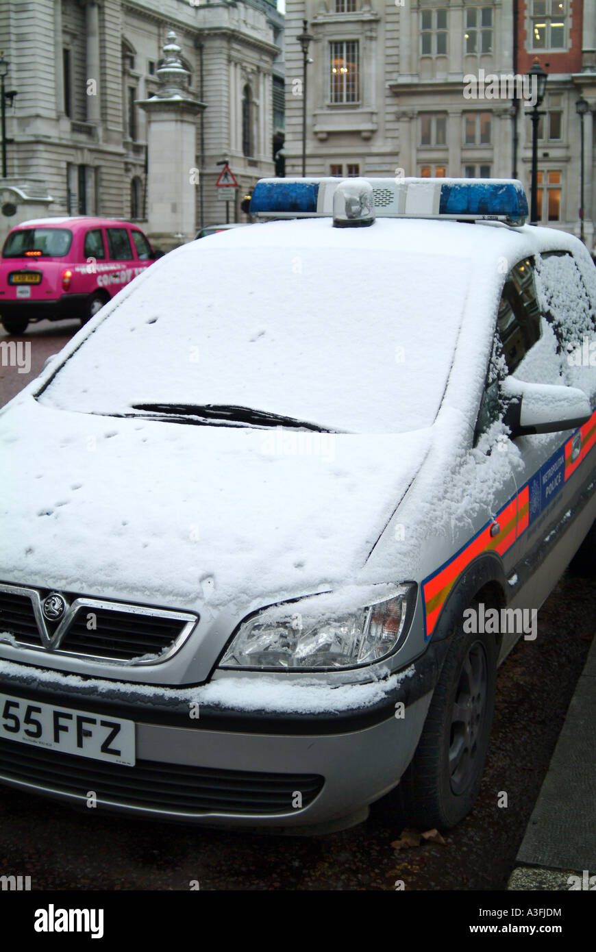 Police car in the snow in London Stock Photo - Alamy