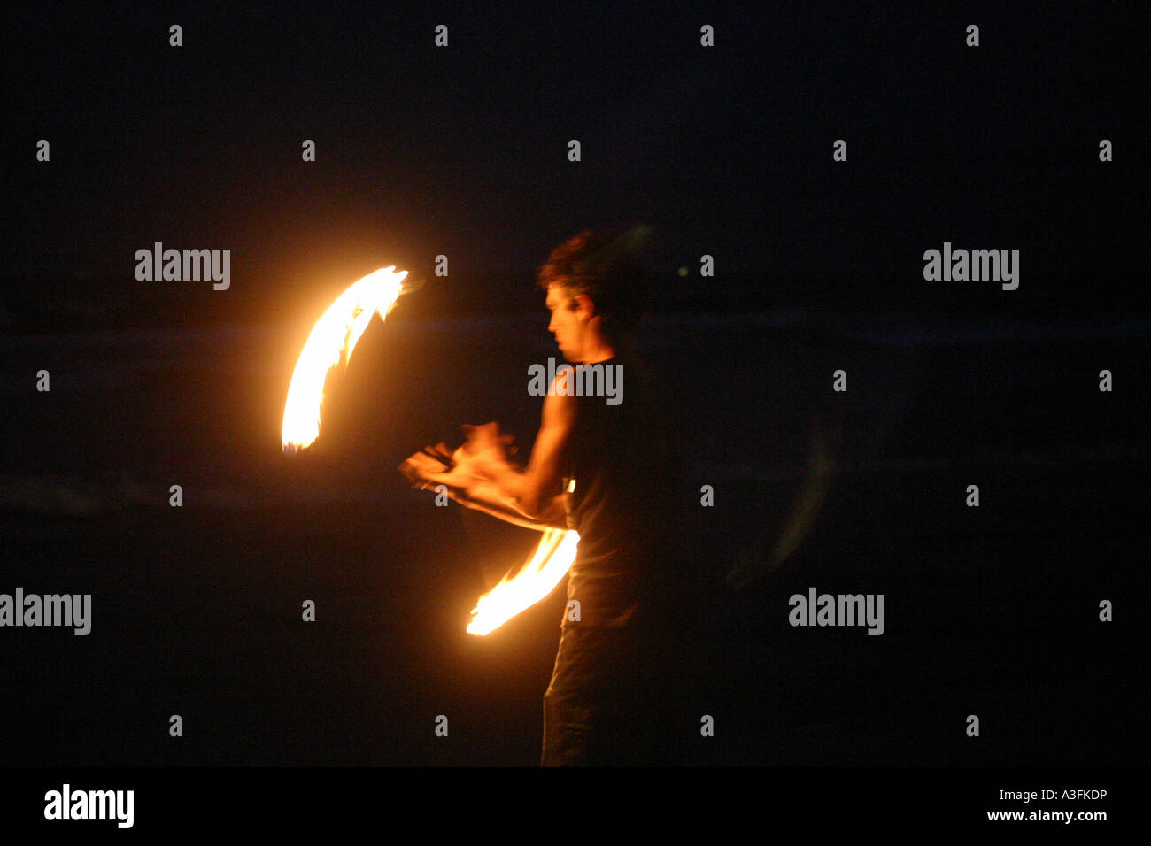 MALE FIRE TWIRLER HORIZONTAL BAPDB9527 Stock Photo - Alamy