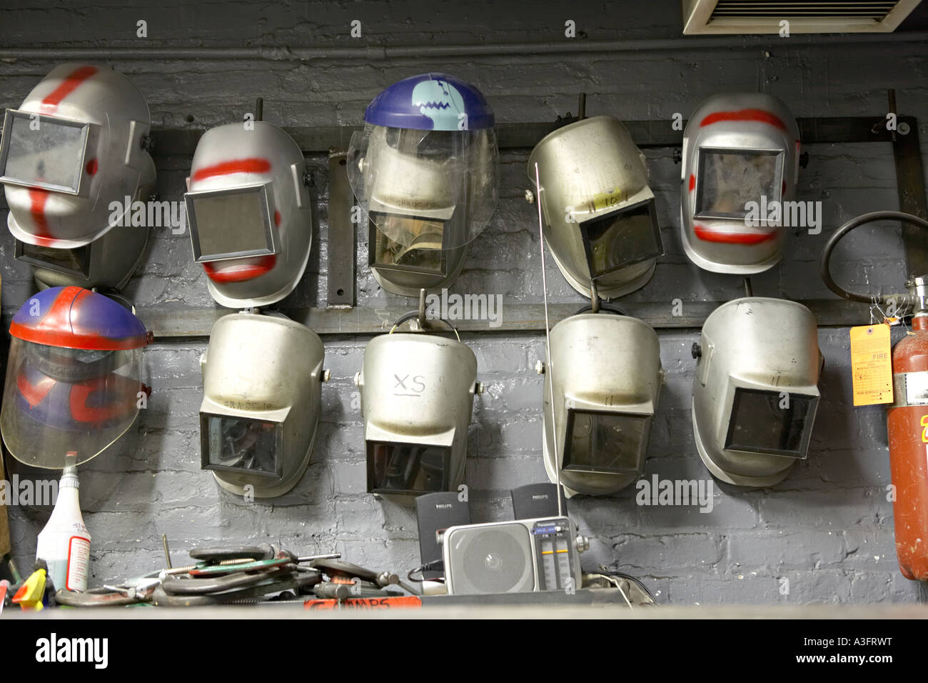 Welders Masks and safety masks hanging on wall Welders welder mask ...
