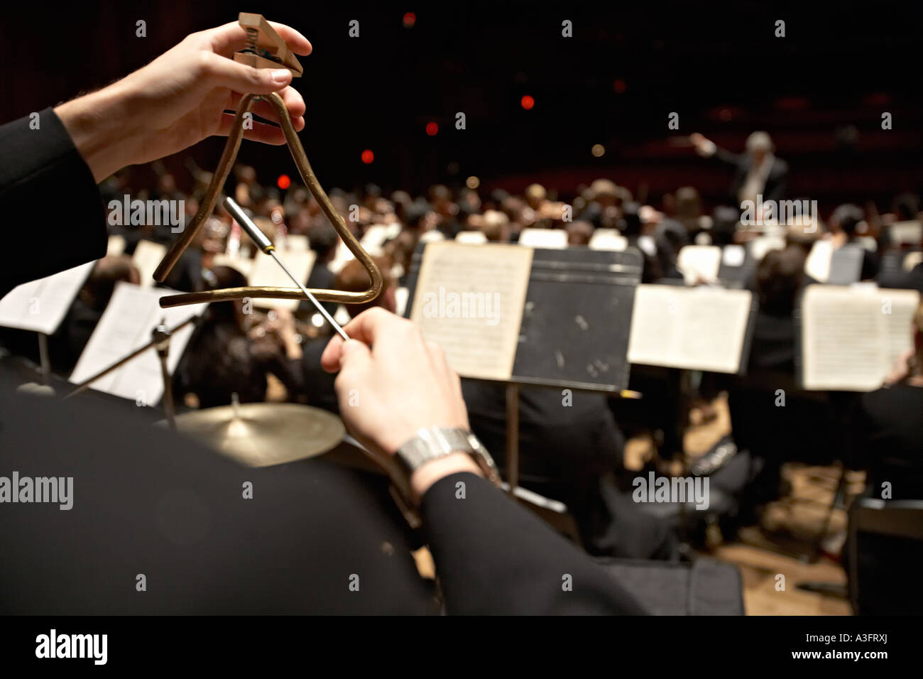 Close up of conductor s hands conducting an orchestra Stock Photo - Alamy
