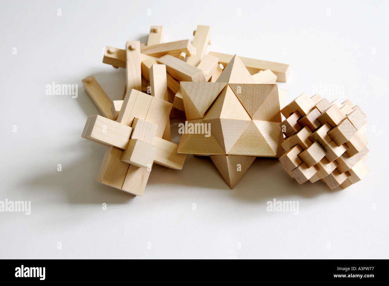 Wooden Puzzles on site background, symbolising problem solving Stock ...