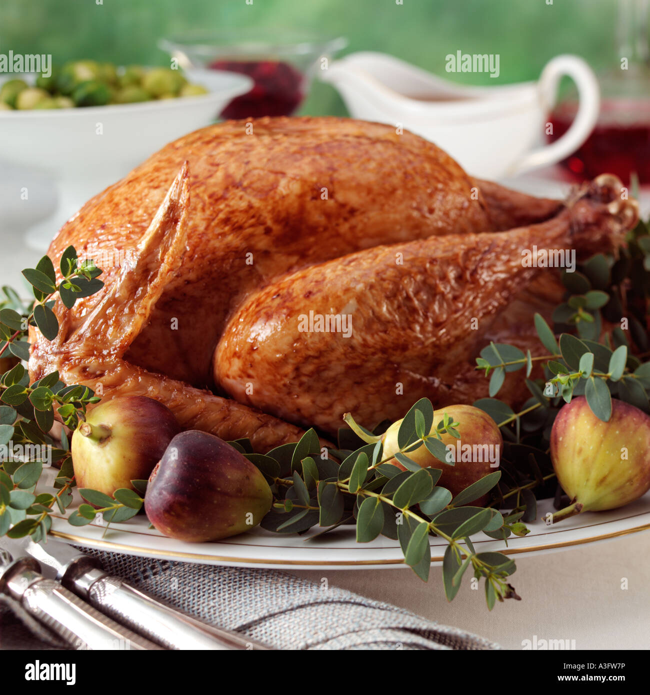A whole roast turkey in a table setting Stock Photo - Alamy