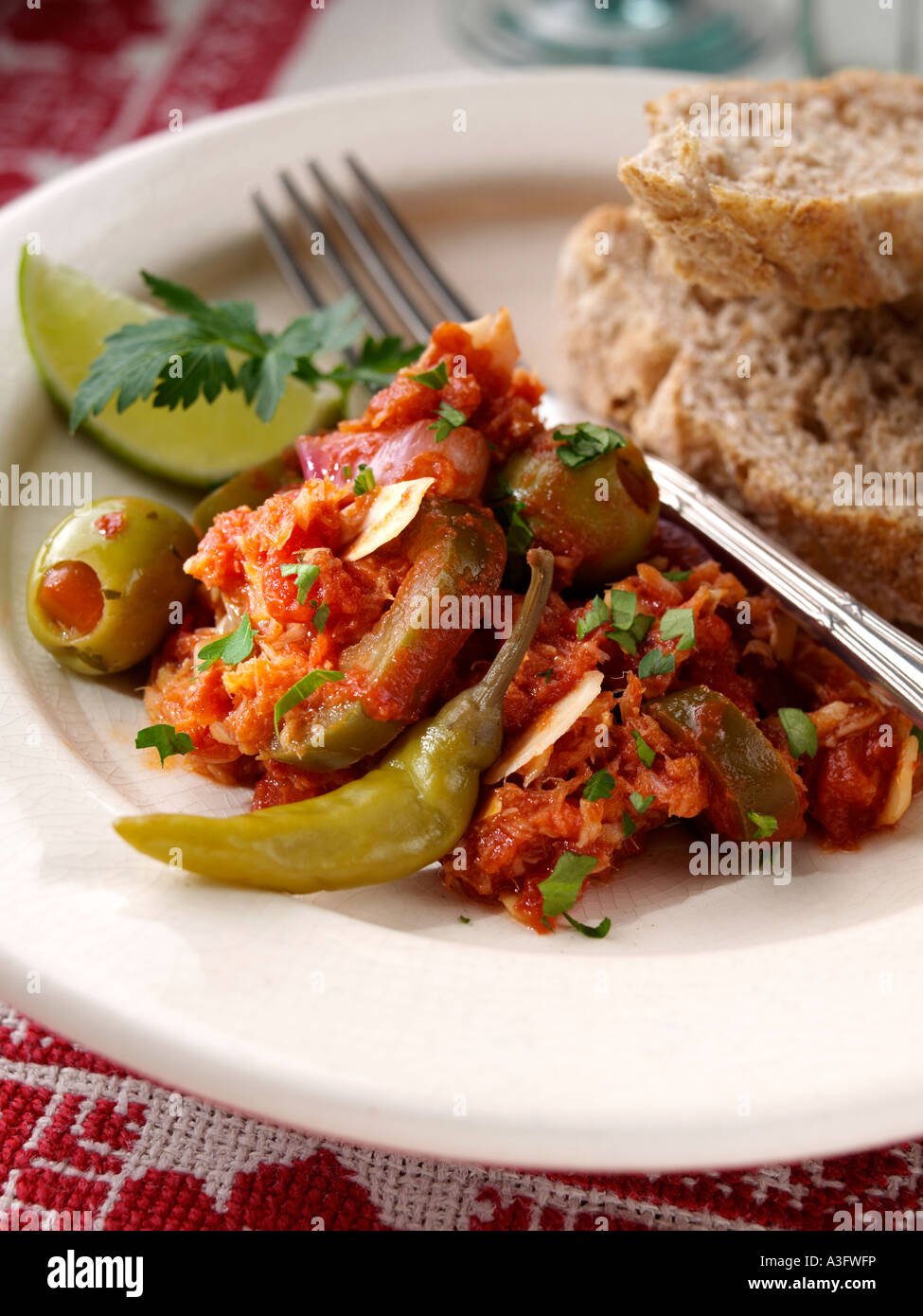 Spanish salt cod bacalao portion in a Mexican setting editorial food ...