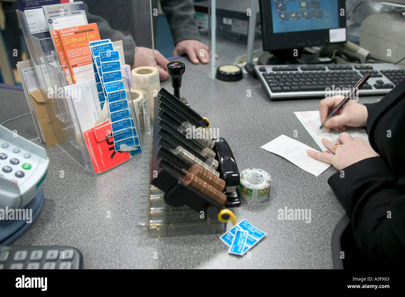 Postal clerk hi-res stock photography and images - Alamy