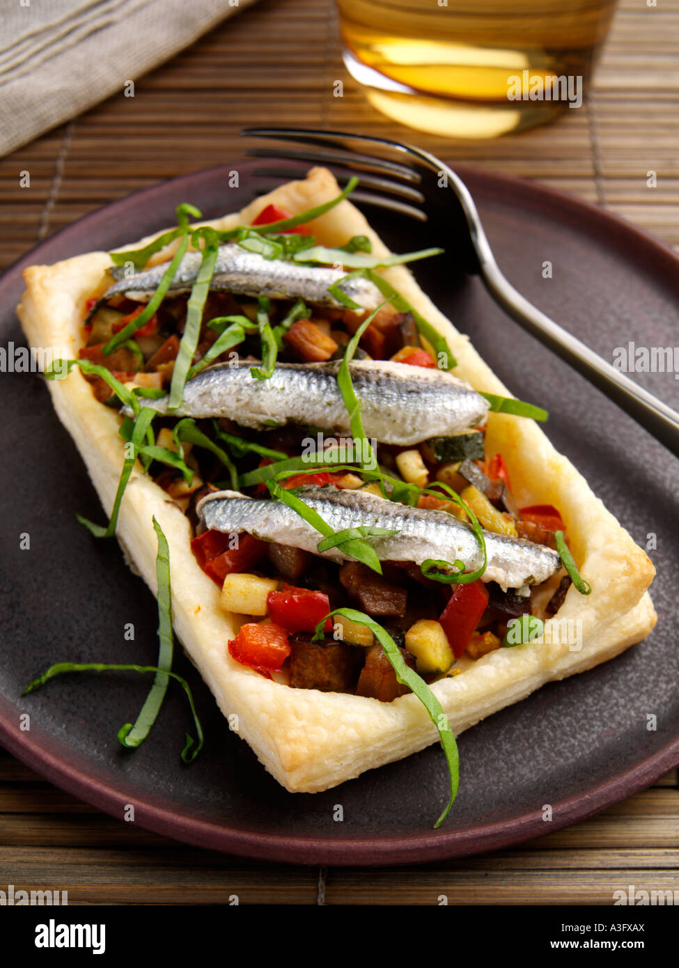 Spanish boquerone and ratatouille tartlet tapas editorial food Stock ...