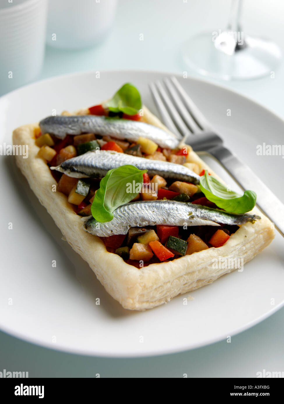 Spanish boquerone and ratatouille tartlet tapas editorial food Stock ...