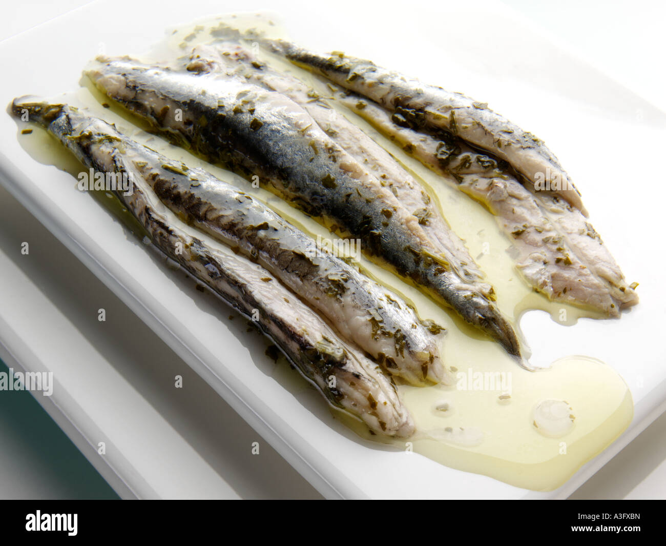 Spanish boquerones on a white platter tapas editorial food Stock Photo ...