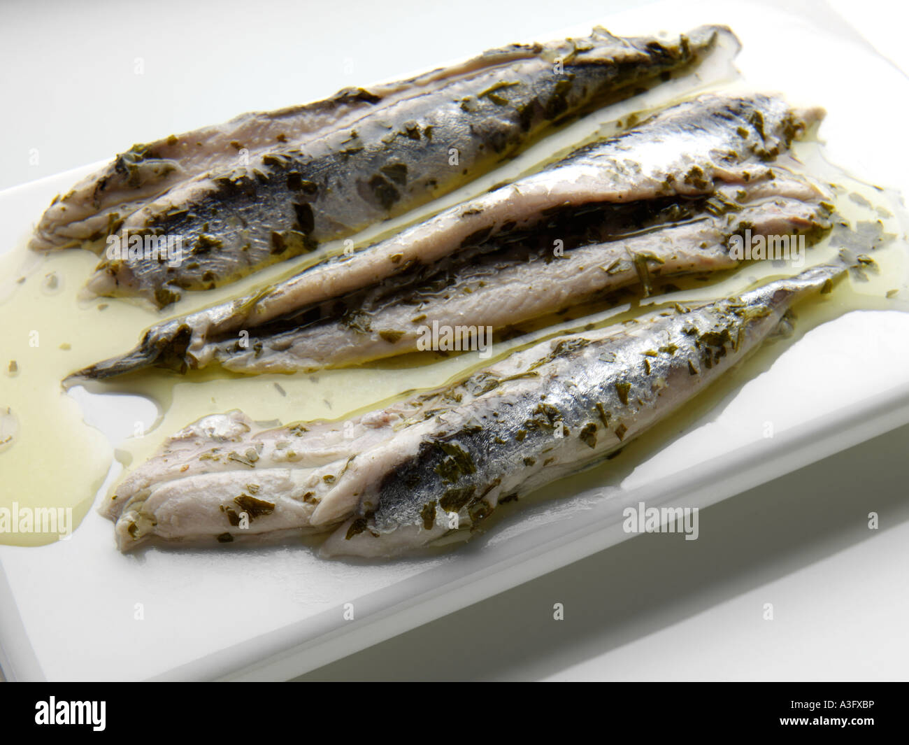 Spanish boquerones on a white platter tapas editorial food Stock Photo ...
