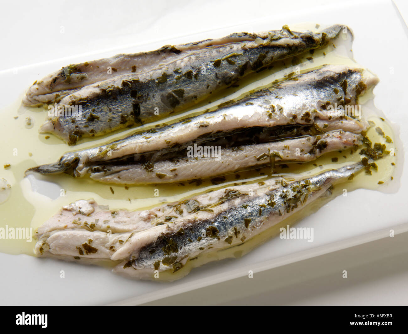 Spanish boquerones on a white platter tapas editorial food Stock Photo ...