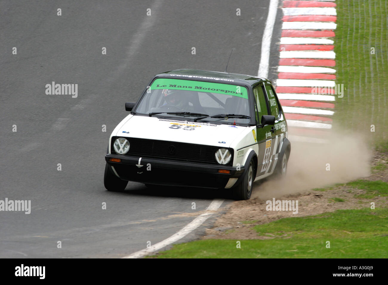 VW Golf racing on race track Stock Photo - Alamy