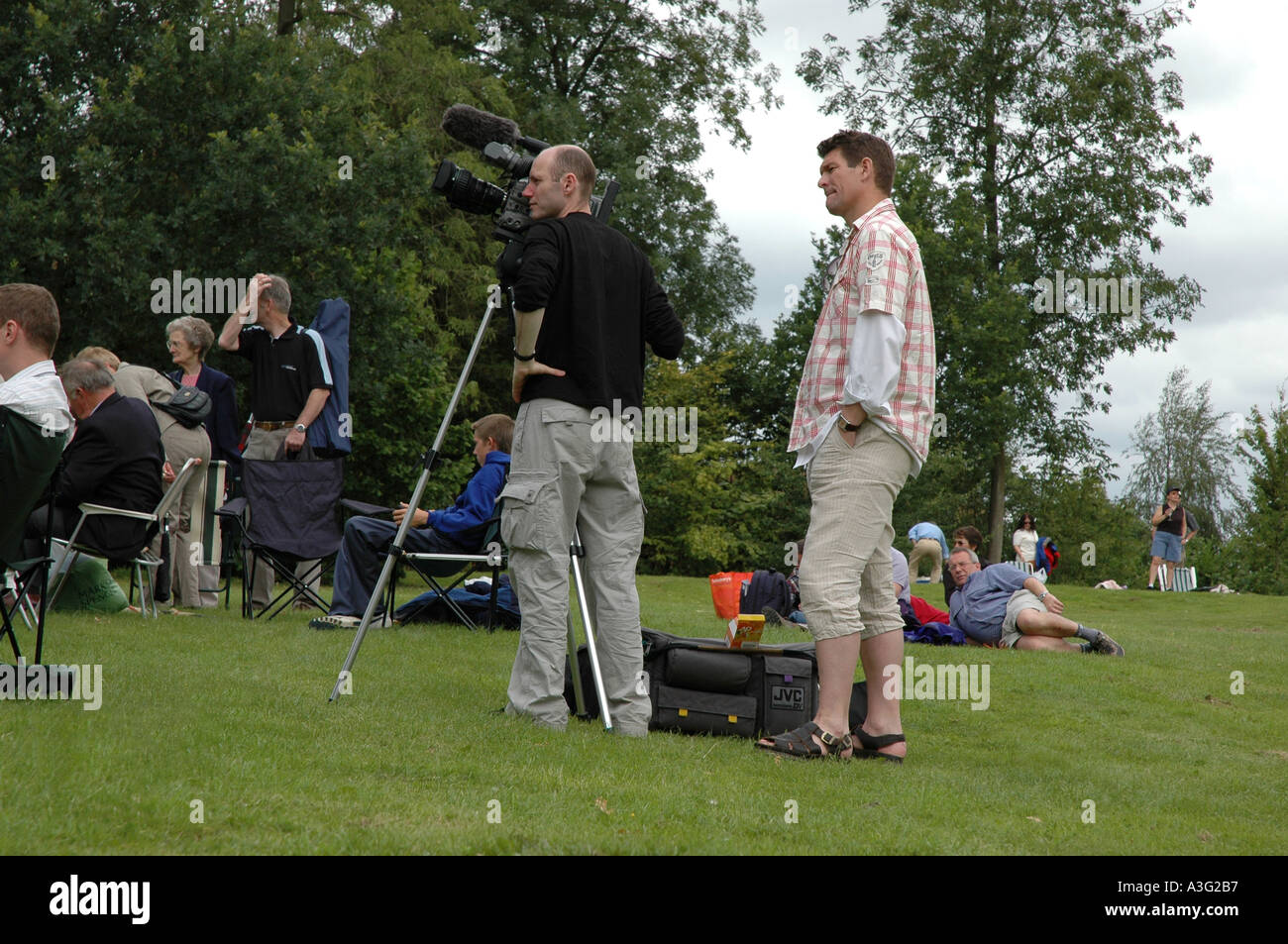 Filming an event Stock Photo - Alamy