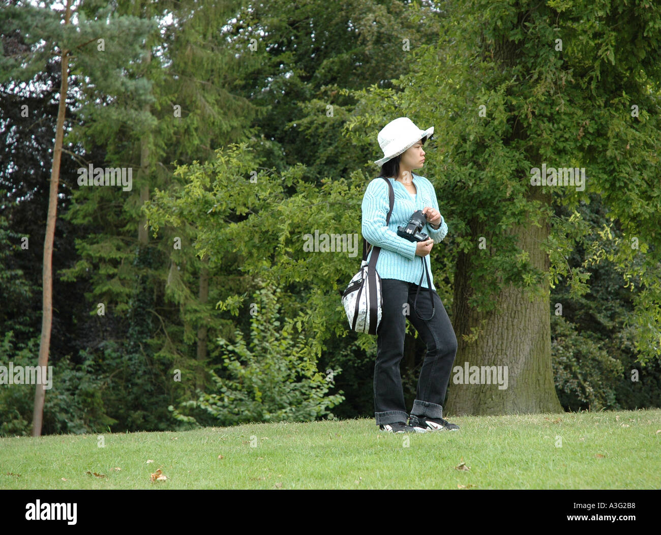 Japanese tourist with a camera Stock Photo - Alamy