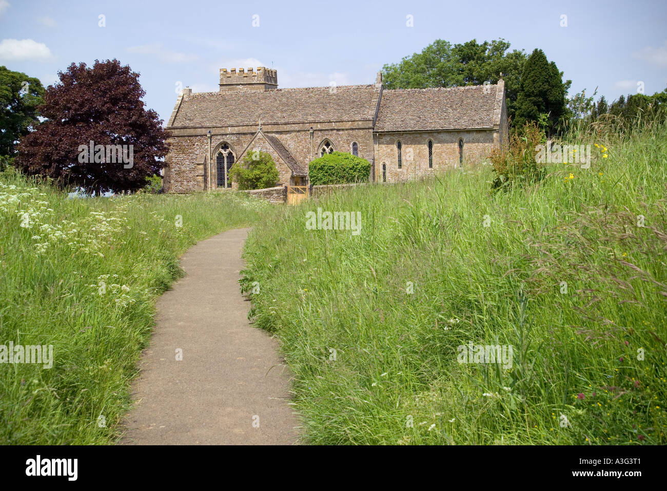 St Peters church in the Cotswold village of Little Rissington ...