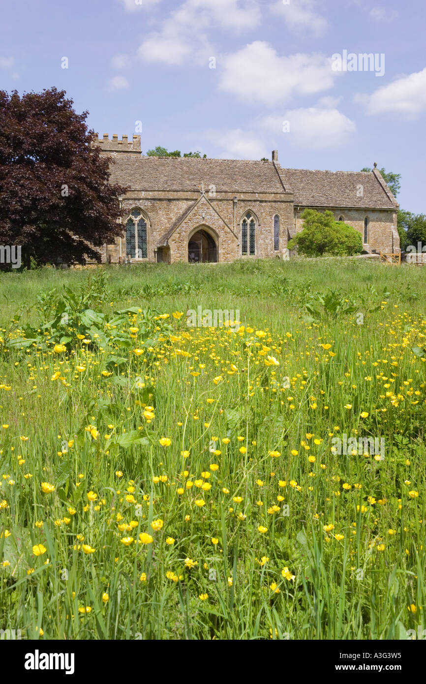 St Peter's church in the Cotswold village of Little Rissington ...