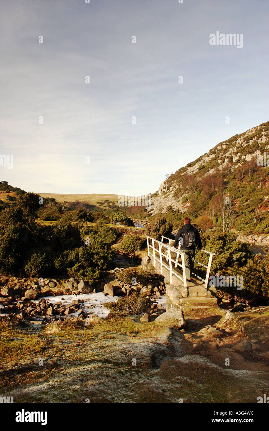 Walker Crossing the Bridge on the Pennine Way Footpath at Pasture Foot ...
