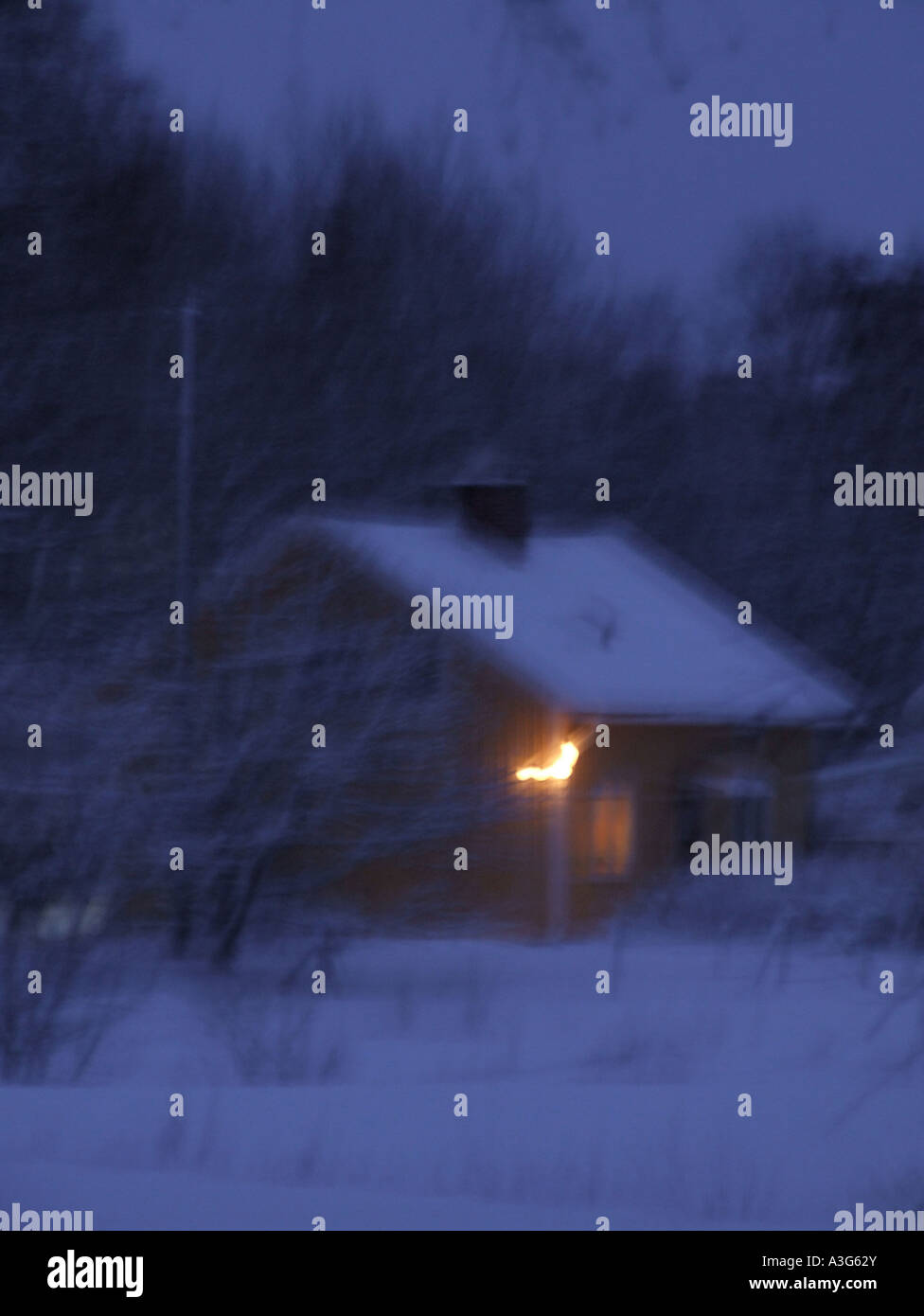 house at night in snow covered woods Stock Photo - Alamy