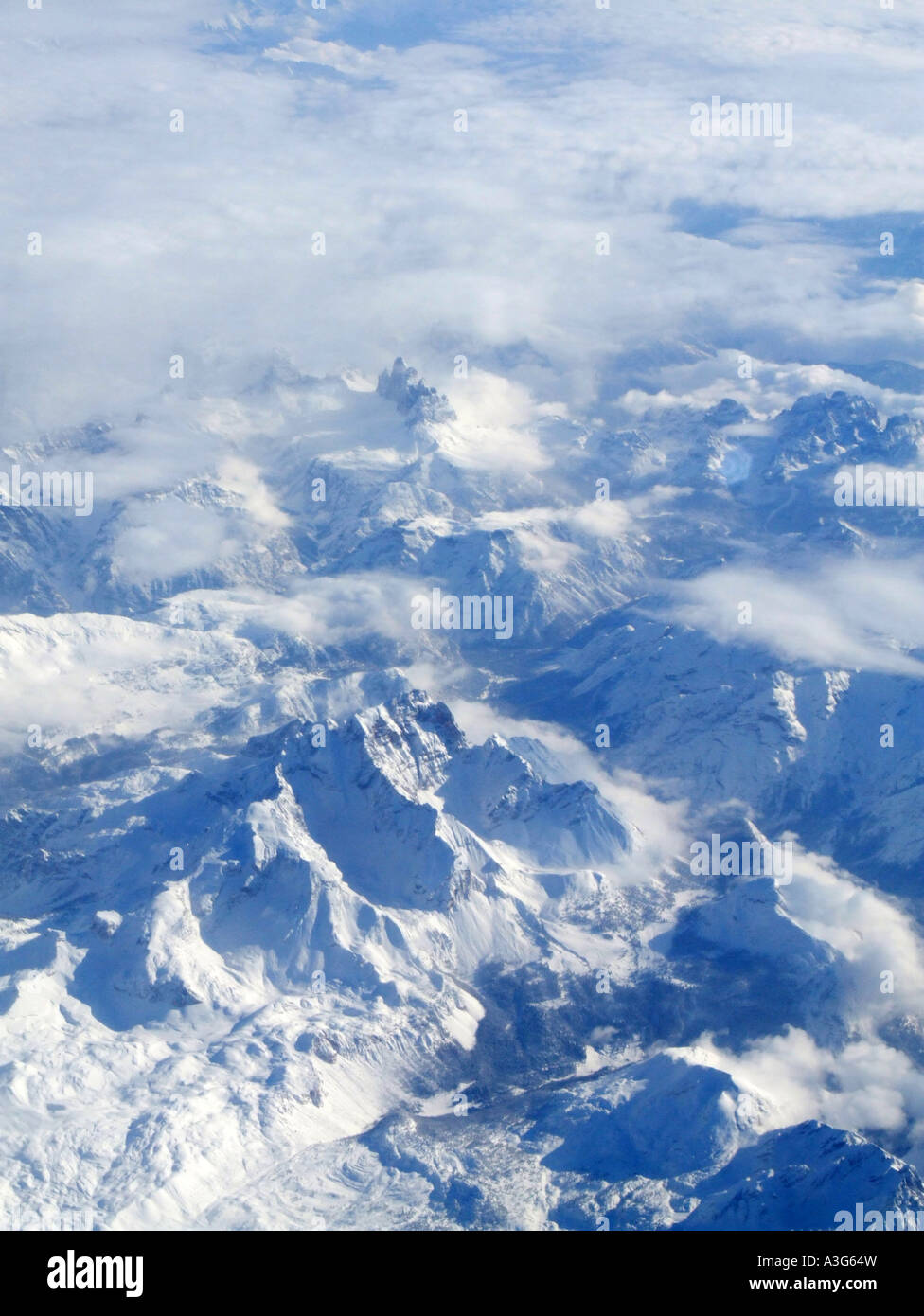 alps mountain range seen from plane window Stock Photo - Alamy