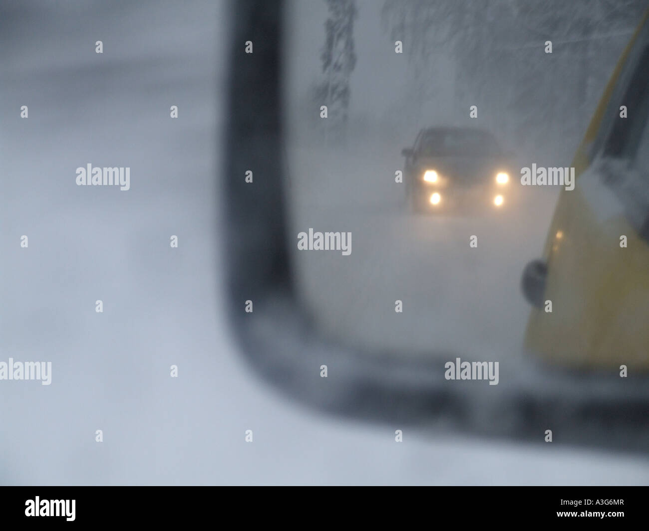 car driving in heavy snow storm Stock Photo - Alamy