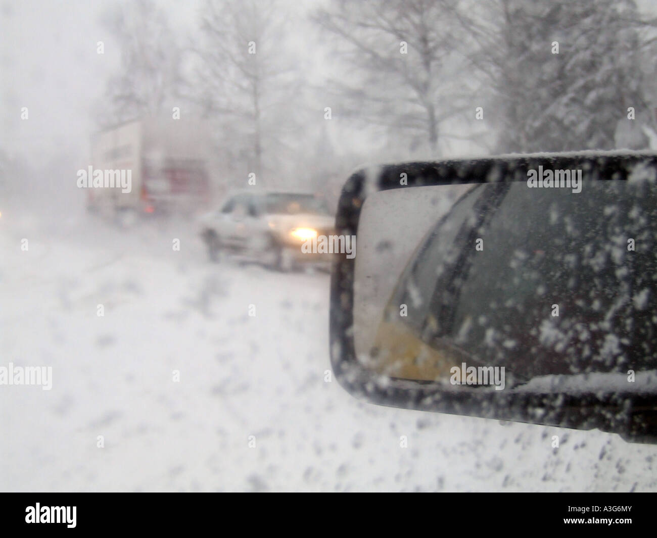 car driving in heavy snow storm Stock Photo - Alamy