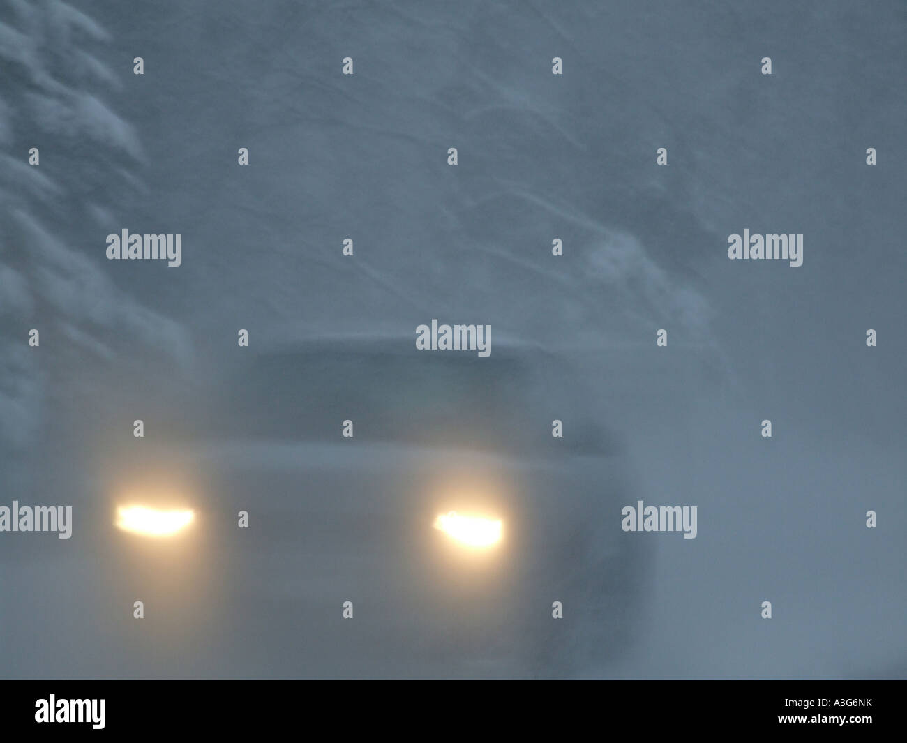 car driving in heavy snow storm Stock Photo - Alamy