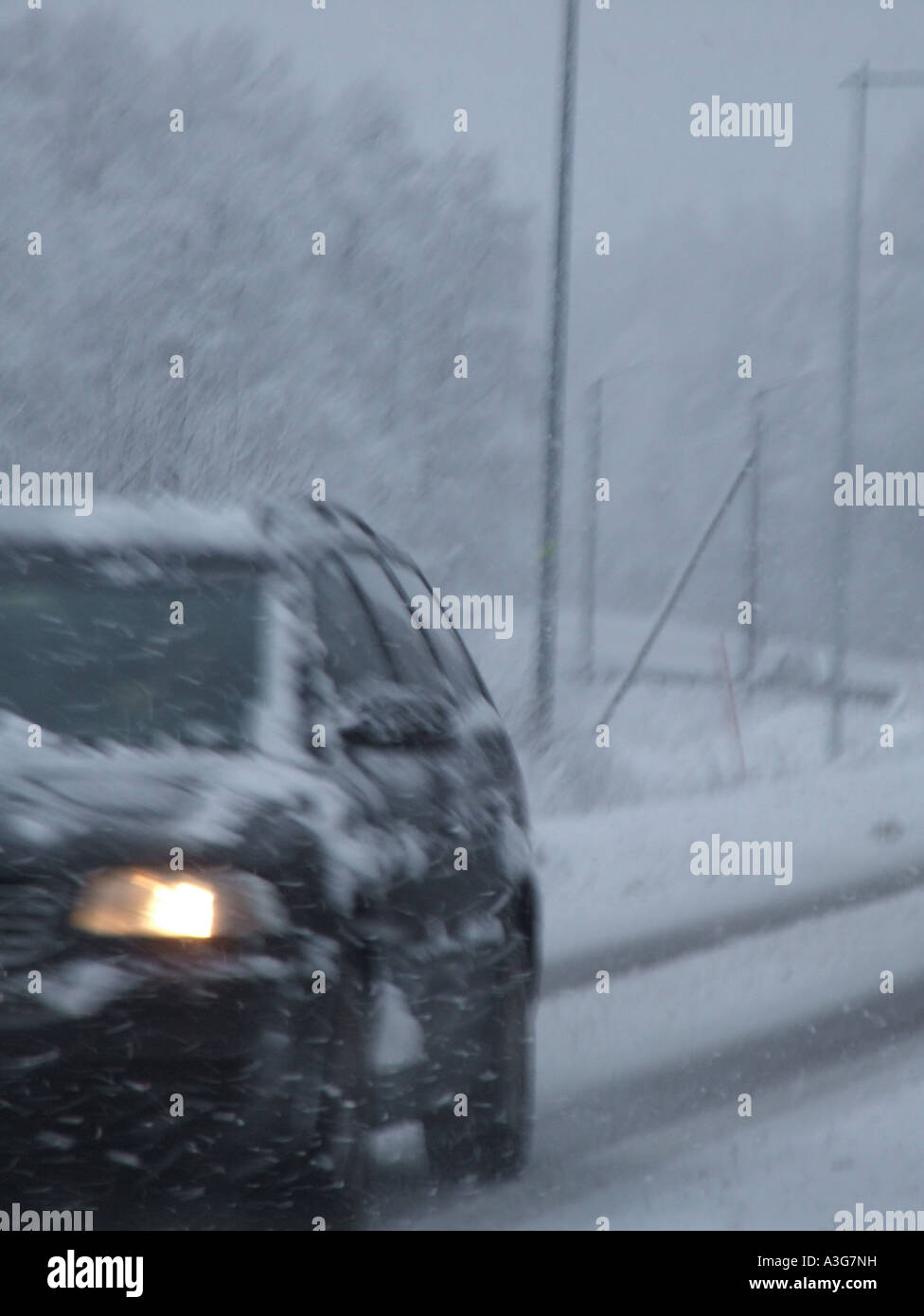 one car driving in heavy snow in sweden Stock Photo - Alamy