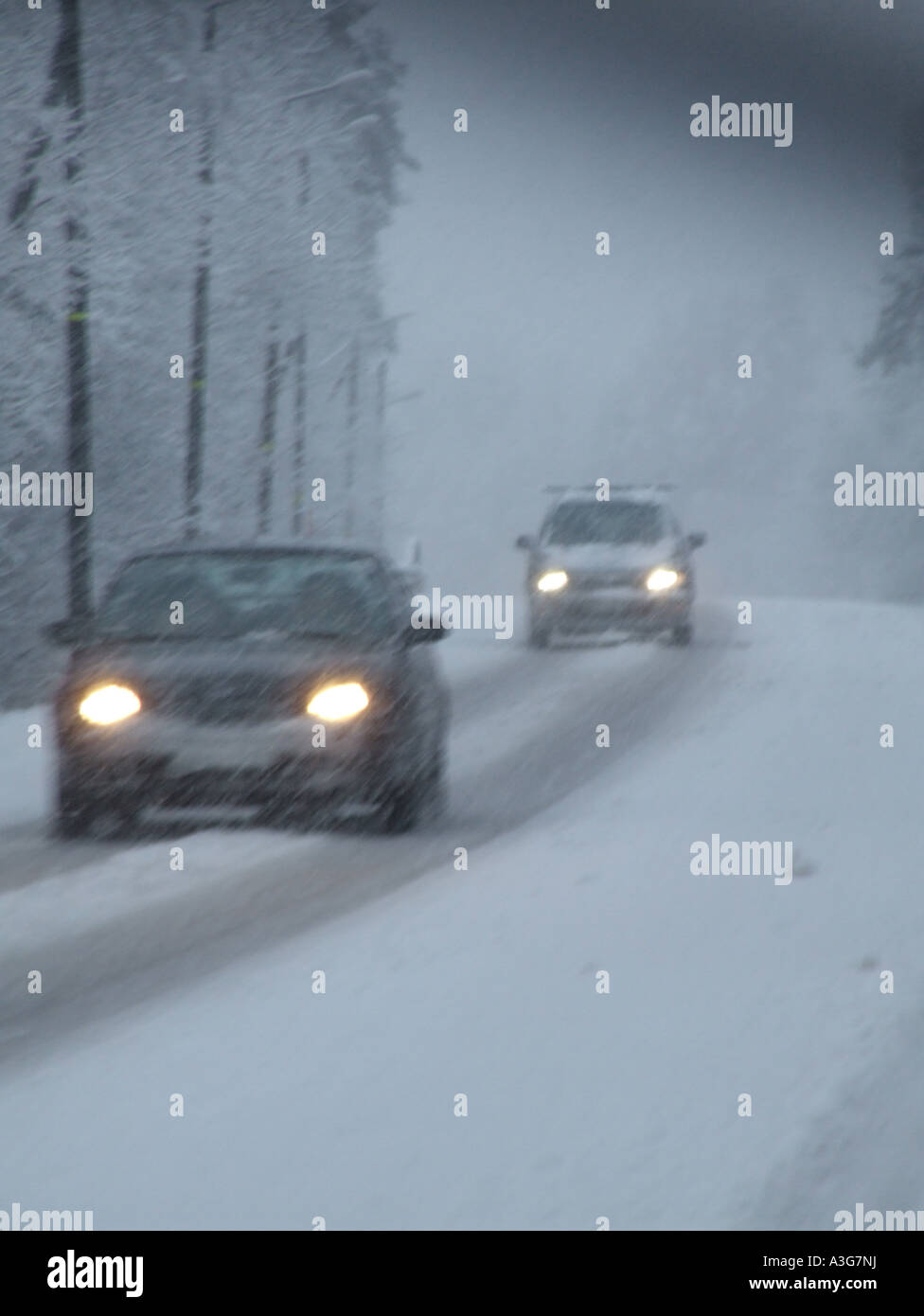 two cars driving in heavy snow in sweden Stock Photo - Alamy