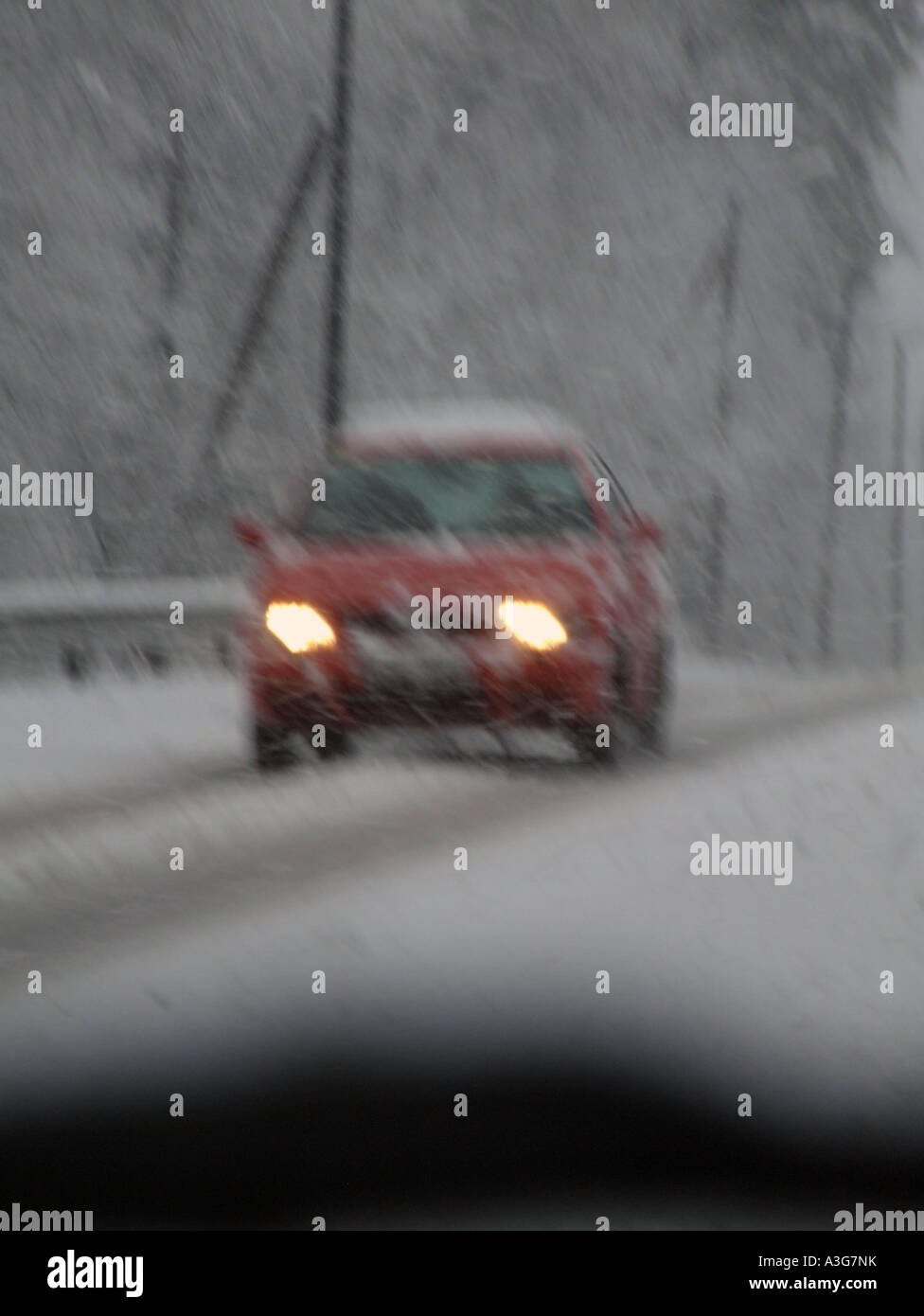 one car driving in heavy snow in sweden Stock Photo - Alamy