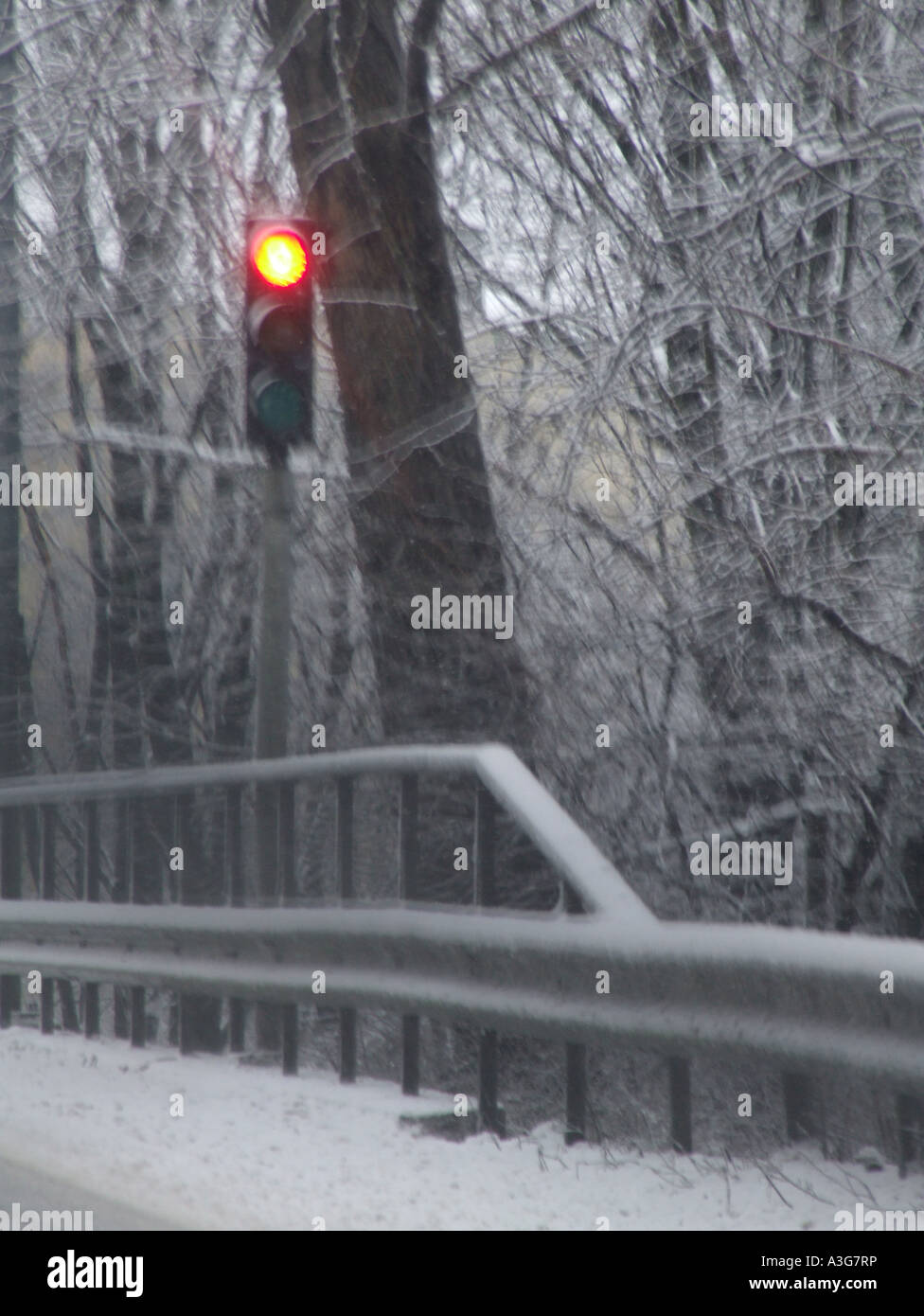 traffic lights on snow covered road Stock Photo - Alamy