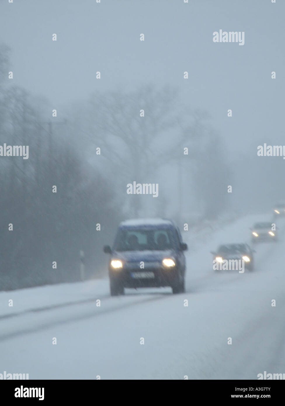 four cars driving in heavy snow in sweden Stock Photo - Alamy